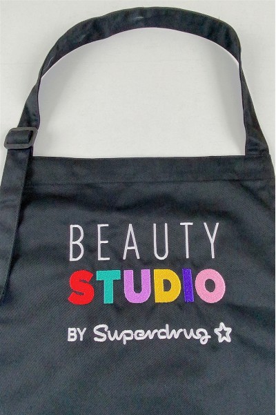 Order large quantities of black halter neck aprons, makeup counter ...