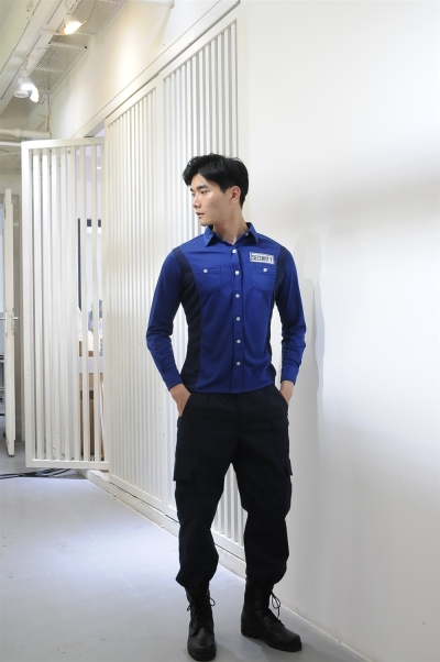 Tailor-made security uniform model shows the store of slim-fitting and ...